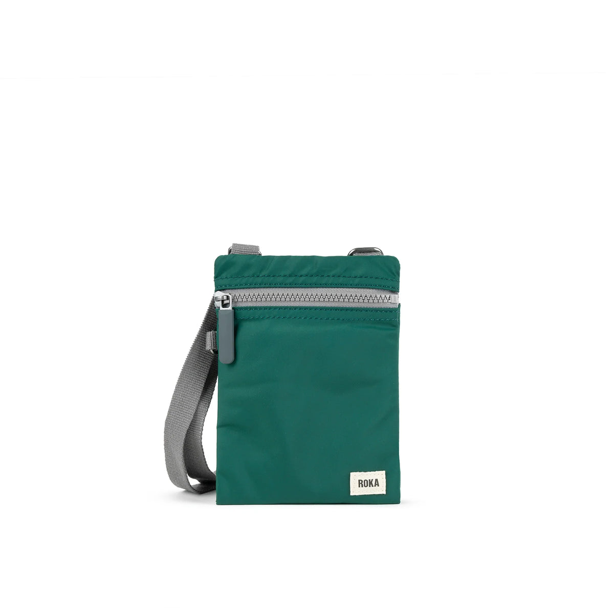 ROKA Chelsea Recycled Nylon Pocket Sling Bag | Teal – itsy Bitsy Boutique